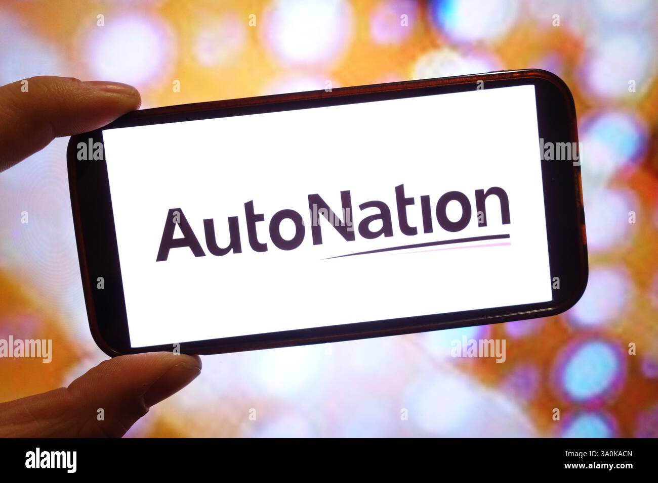 In this photo illustration, the AutoNation company logo is seen ...