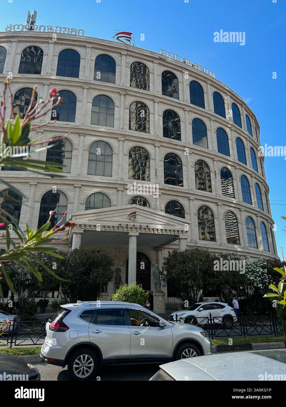 A multi-story building designed to resemble the Colosseum, with arched ...
