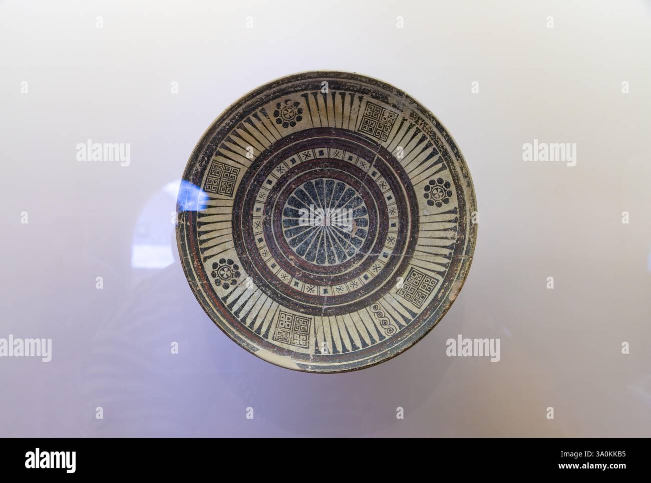 A picture of a ceramics plate inside of the Archaeological Museum of ...
