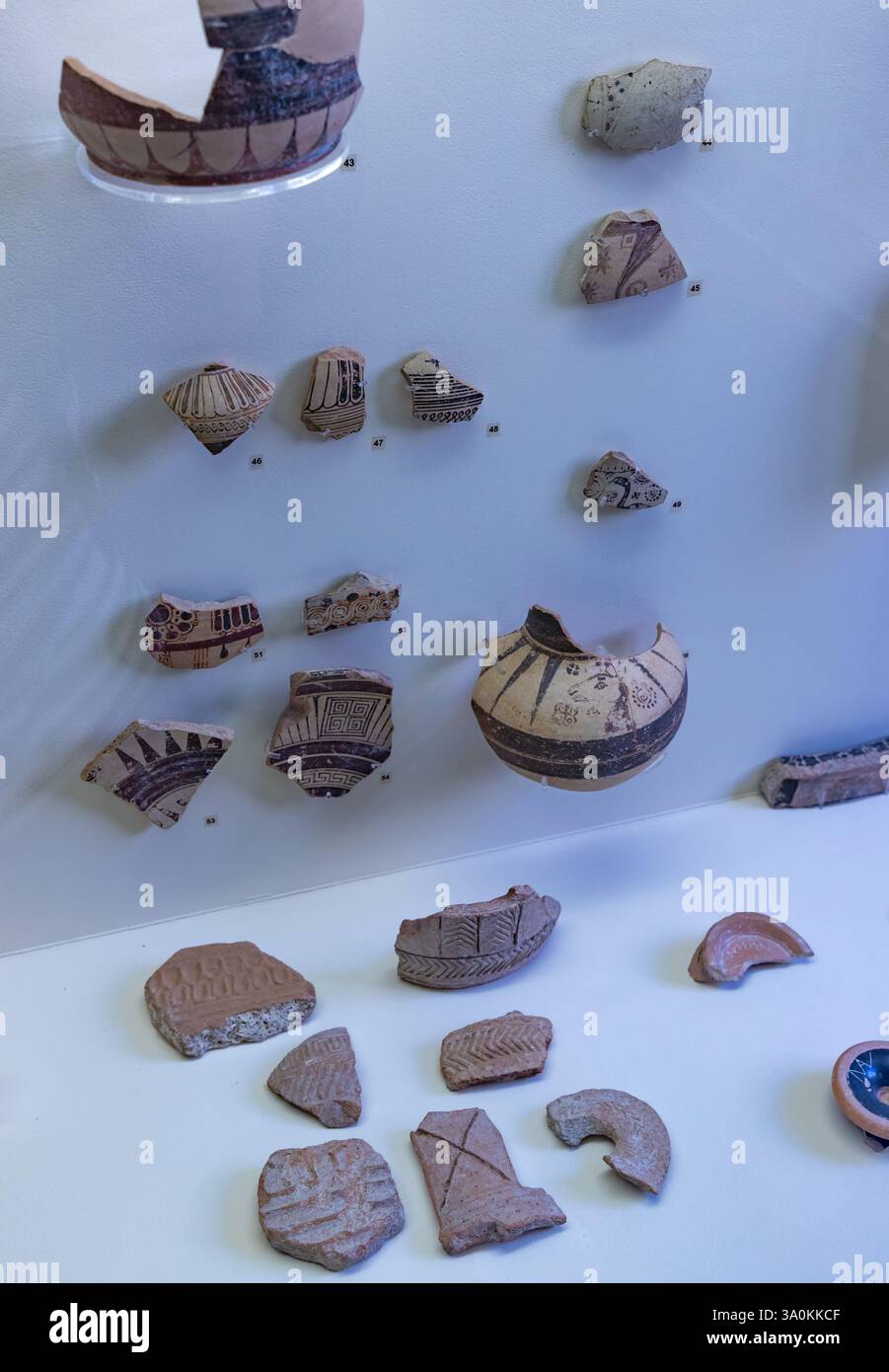 A picture of a few artifact parts inside of the Archaeological Museum ...