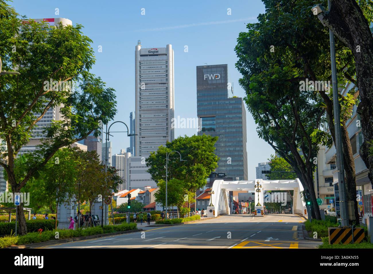 Singtel logo on Comcentre Building (left) and FWD logo on One George ...