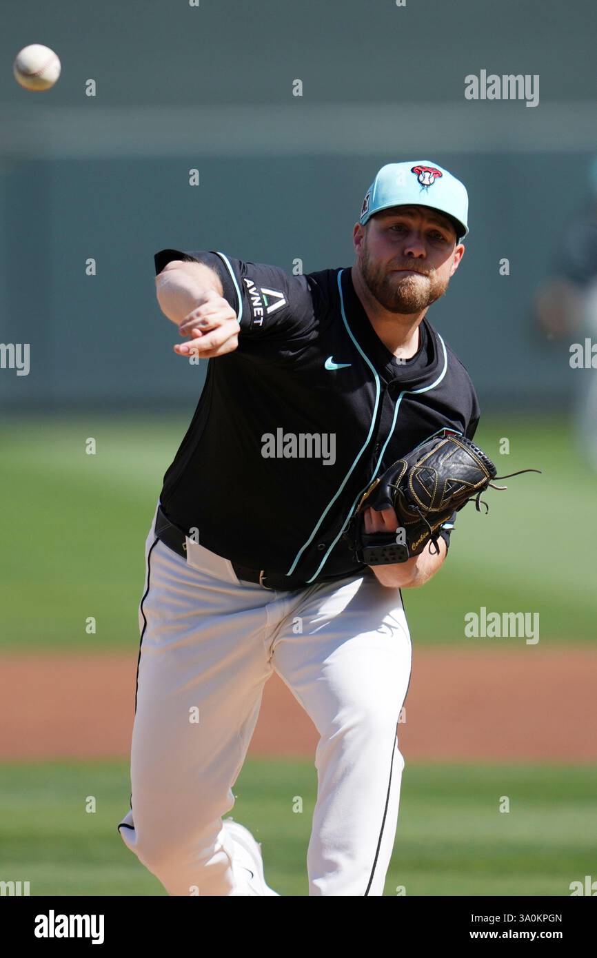 Arizona Diamondbacks pitcher Corbin Burnes warms up prior to a spring ...