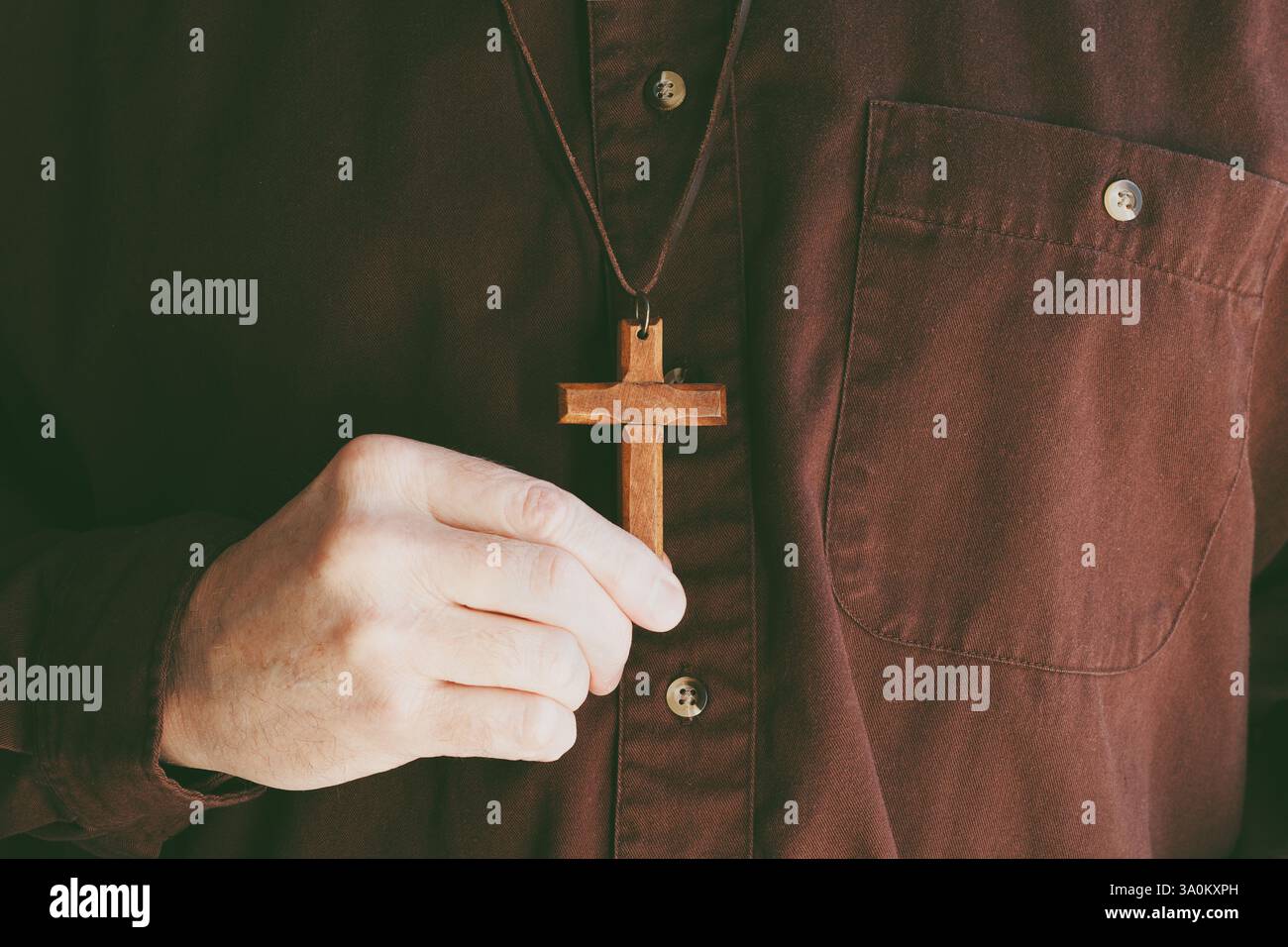Holding holy cross hi-res stock photography and images - Alamy