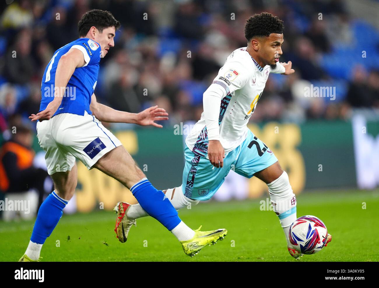 Cardiff City's Callum O'Dowda (left) and Burnley's Marcus Edwards ...