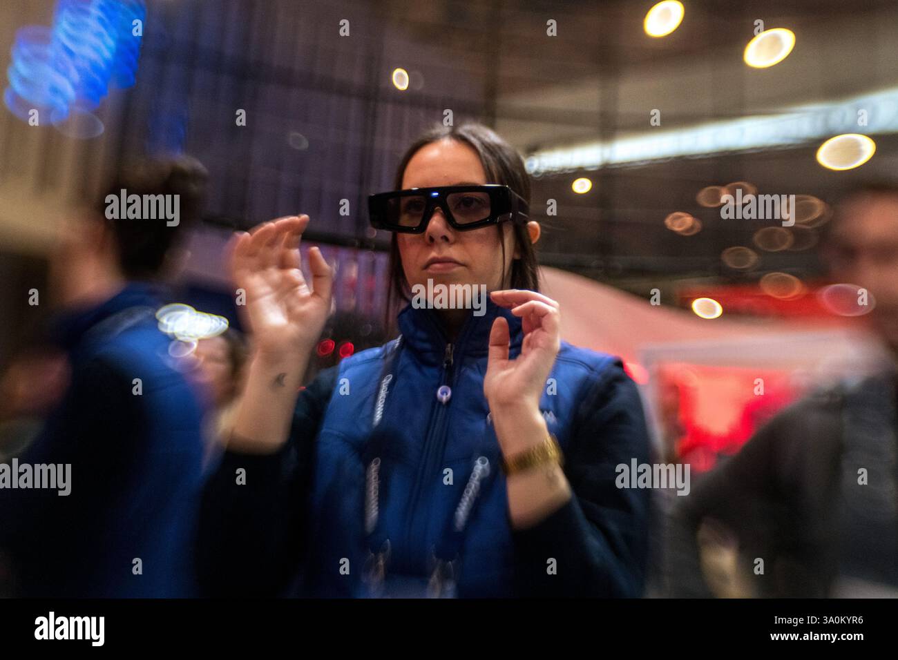 Barcelona, Spain. 4 March, 2025: A visitor experiences AI smart glasses ...