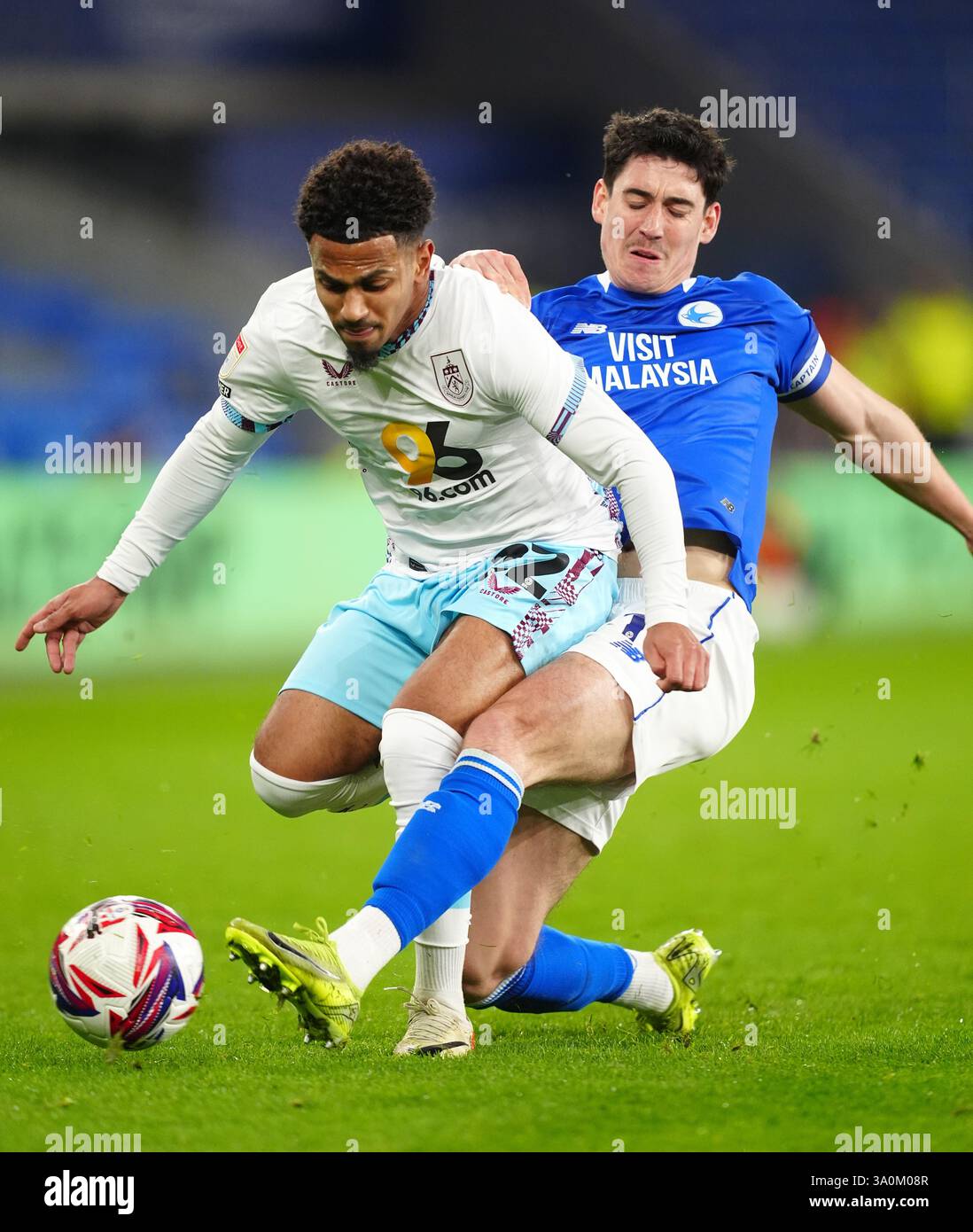 Burnley's Marcus Edwards and Cardiff City's Callum O'Dowda battle for ...