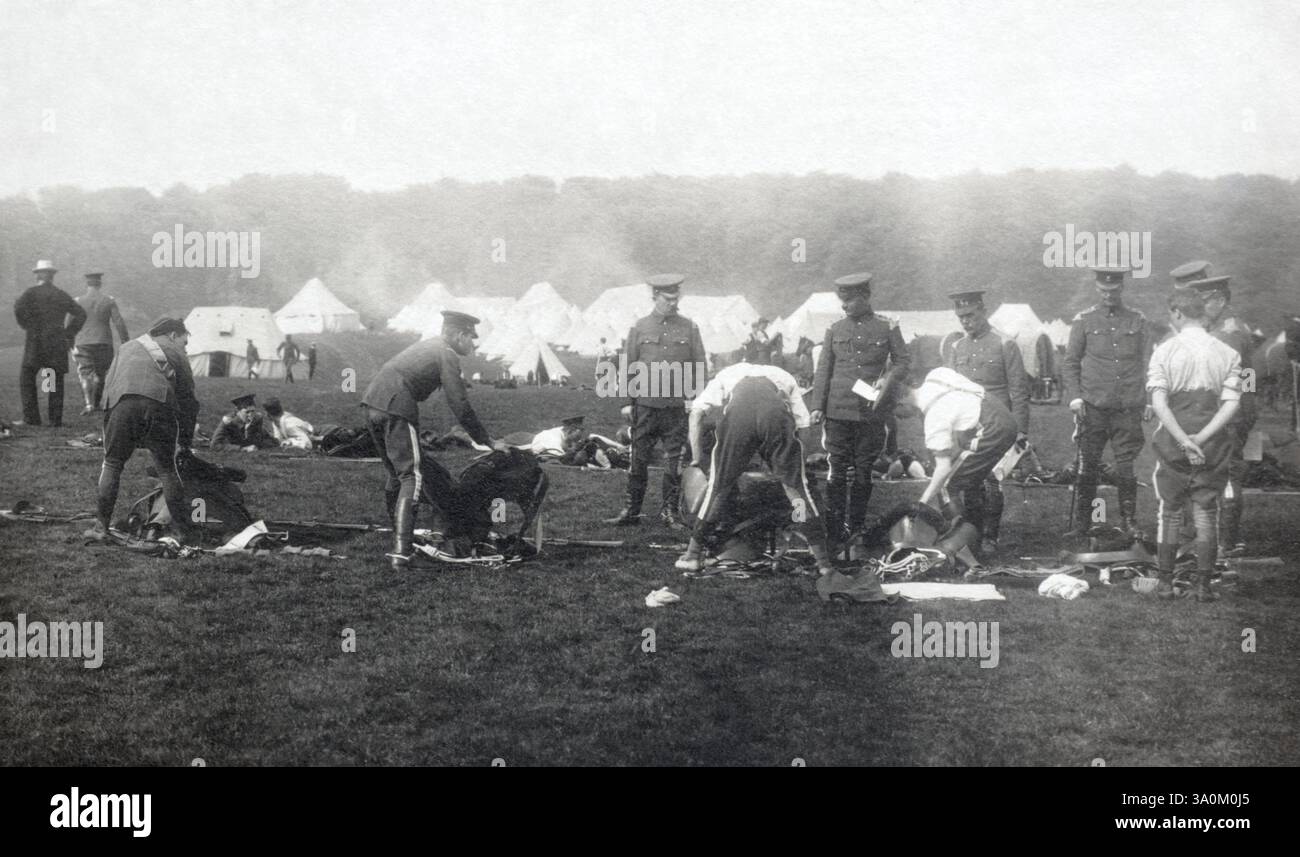 Soldiers of the West Kent Imperial Yeomanry laying out saddles and tack ...