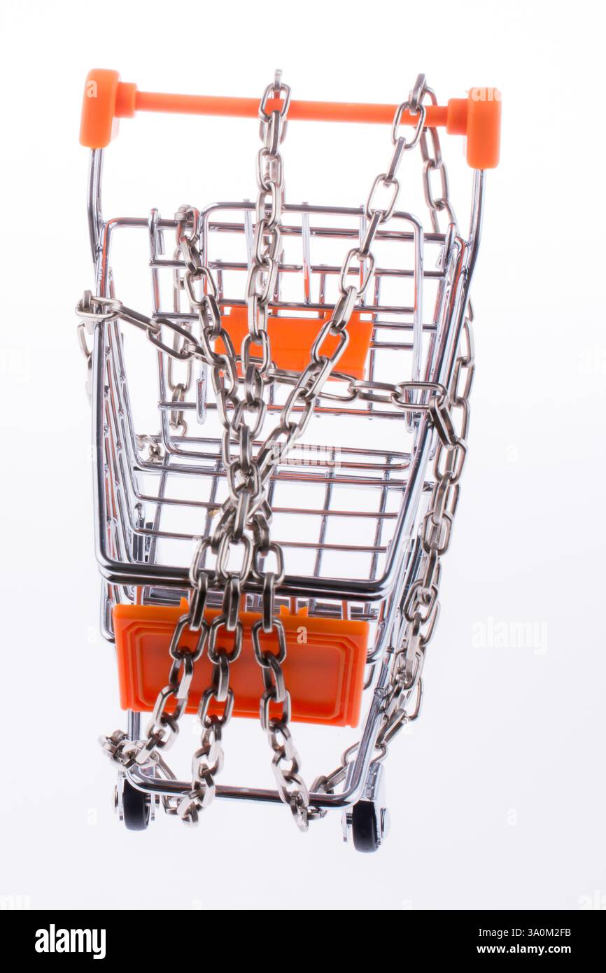 Chained shopping cart in white background Stock Photo - Alamy