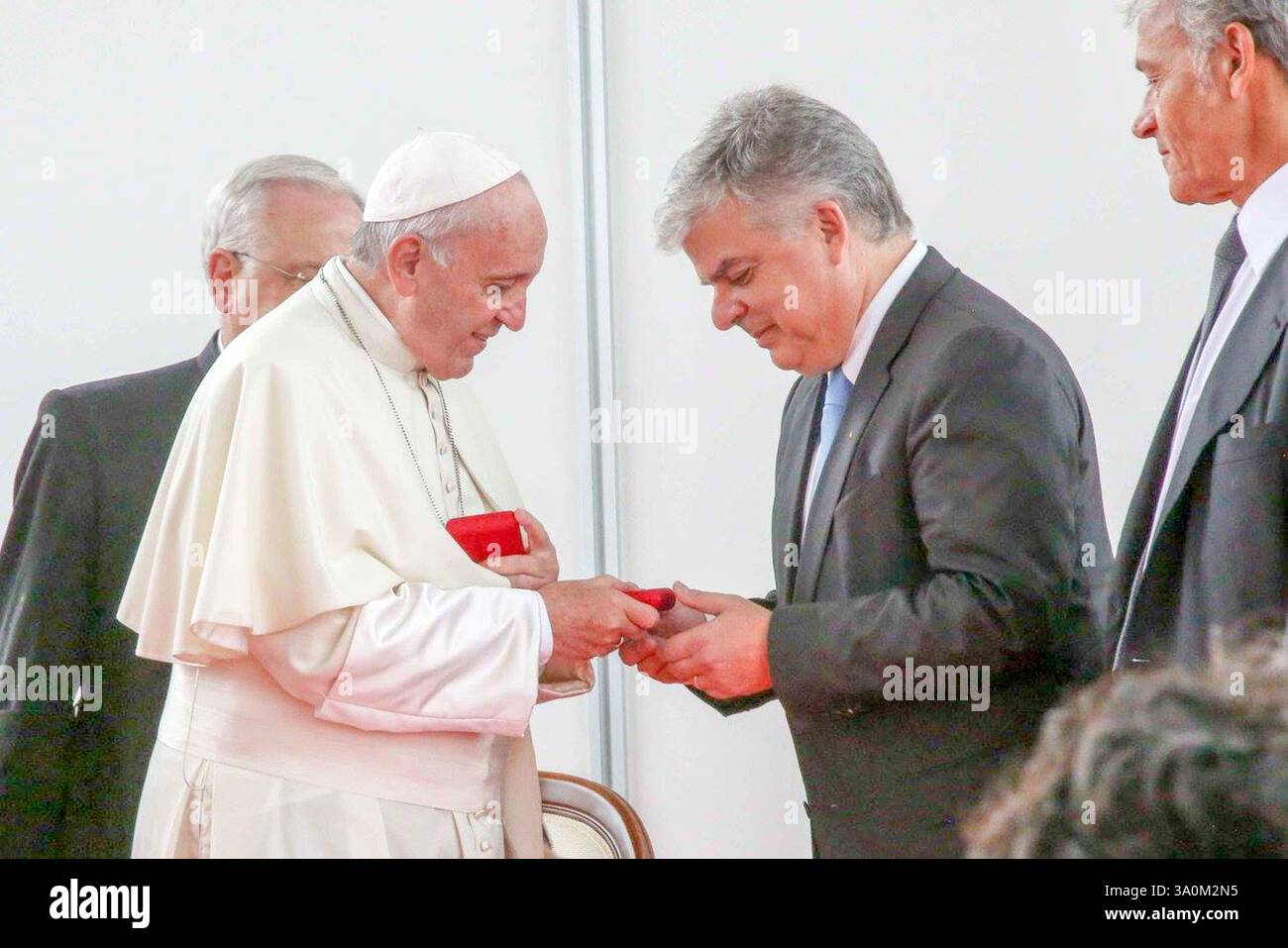 ESC President Professor Fausto Pinto is gifted a medal as a token of ...