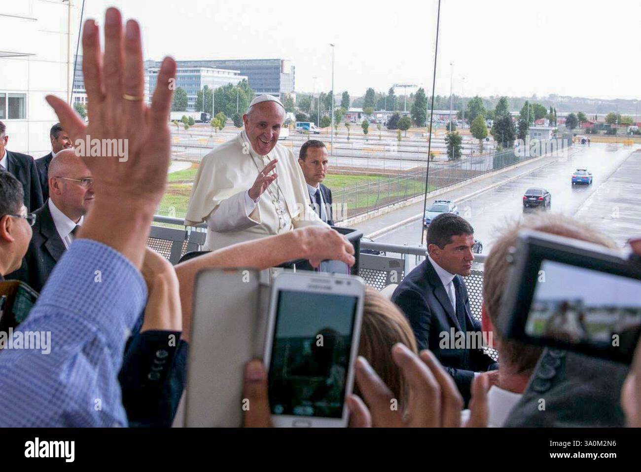 Rome, Italy. 04th Mar, 2025. Pope Francis rides by attendees in a ...
