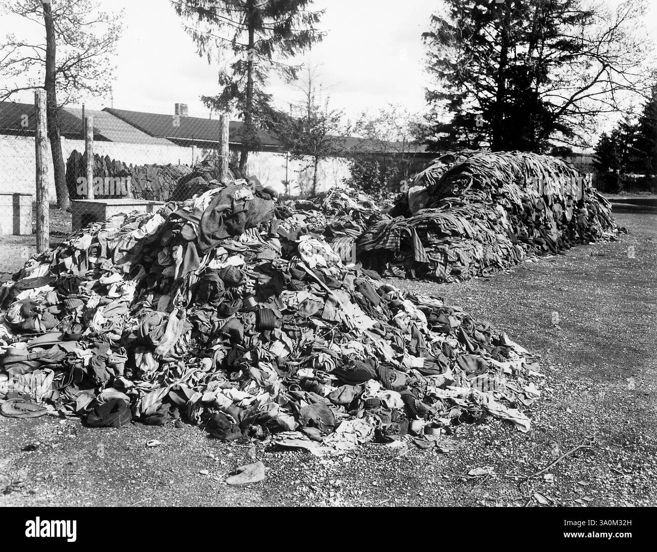 Piles of clothes that belonged to prisoners of Dachau Concentration ...