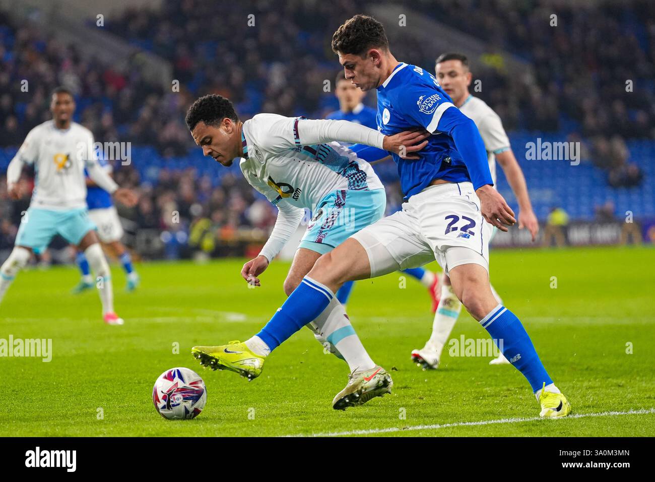Cardiff, UK. 04th Mar, 2025. CJ Egan-Riley of Burnley under pressure ...