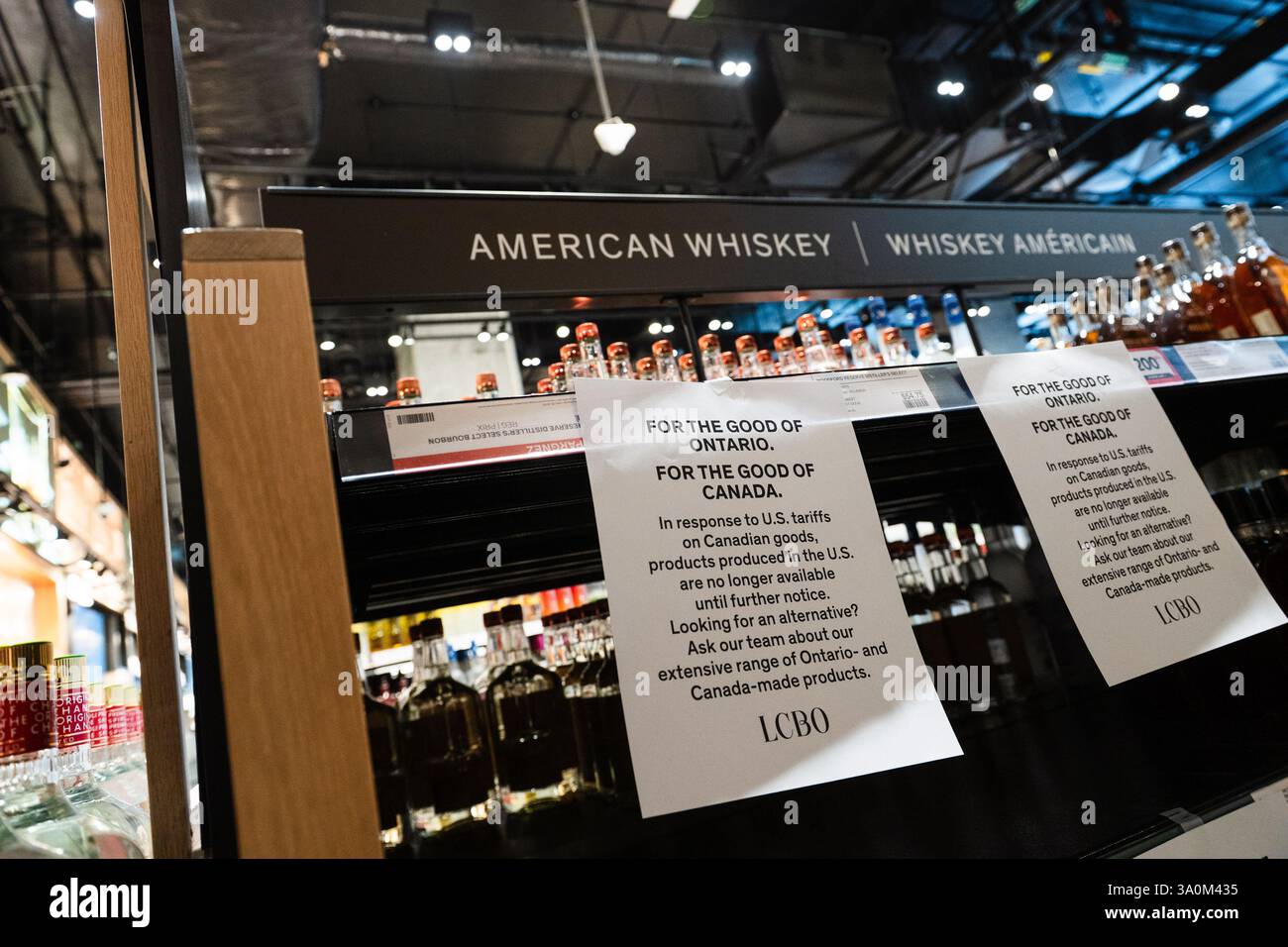 A half-empty shelf of American whiskey is pictured at the 100 Queen‚Äôs ...