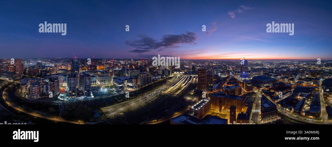 Panoramic aerial view of Leeds during dawn, displaying illuminated ...