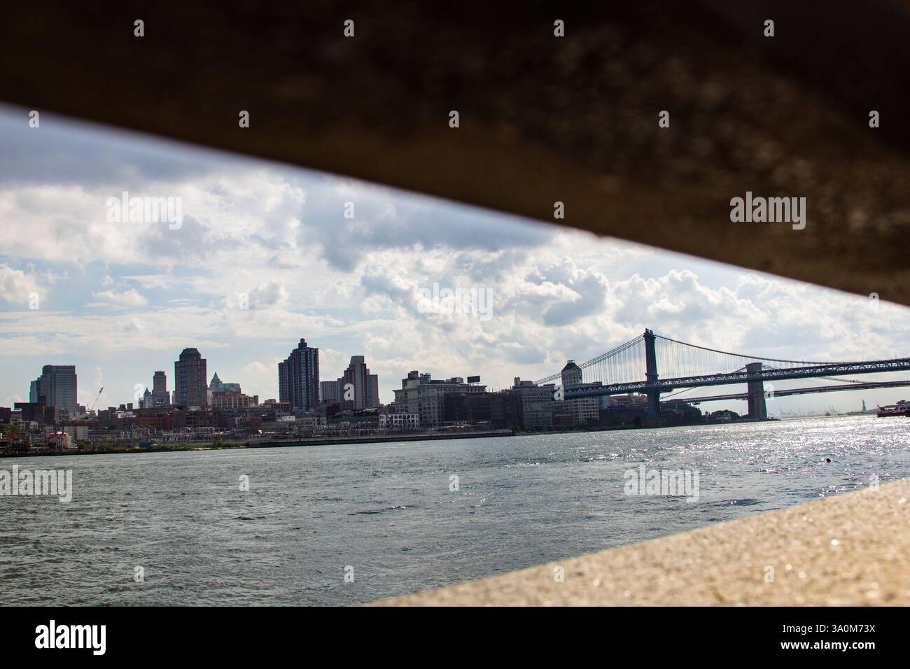 Looking up at Williamsburg Bridge underpass historic and contemporary ...