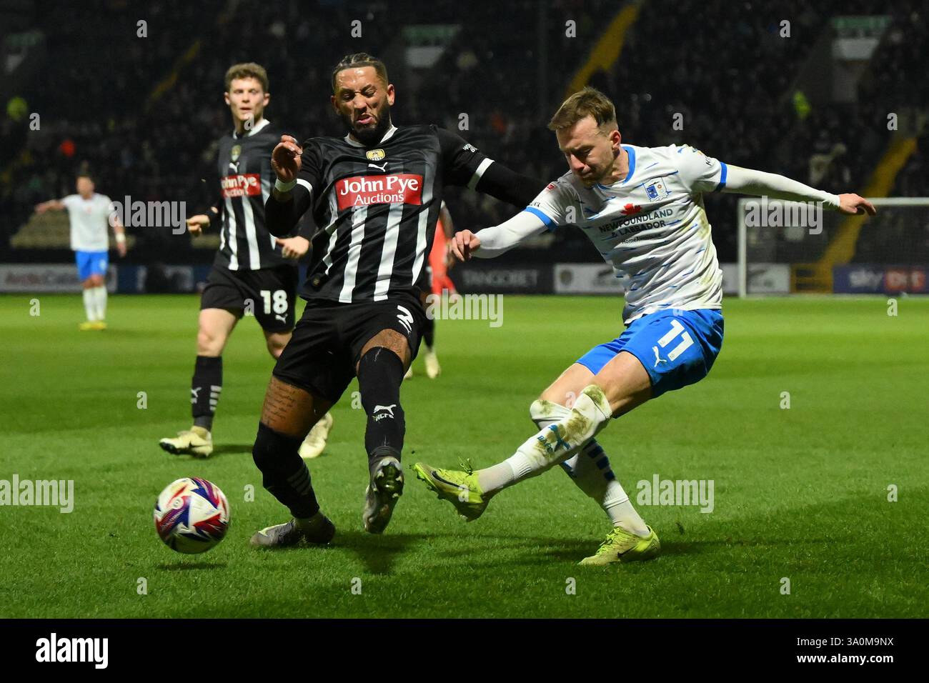 Elliot Newby of Barrow under pressure from Kellan Gordon of Notts ...