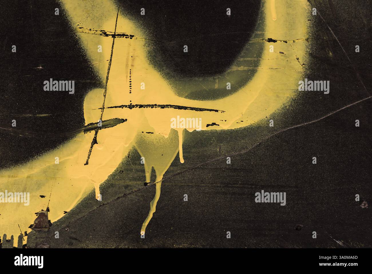 Abstract graffiti fragment, black urban wall with bright yellow spray ...