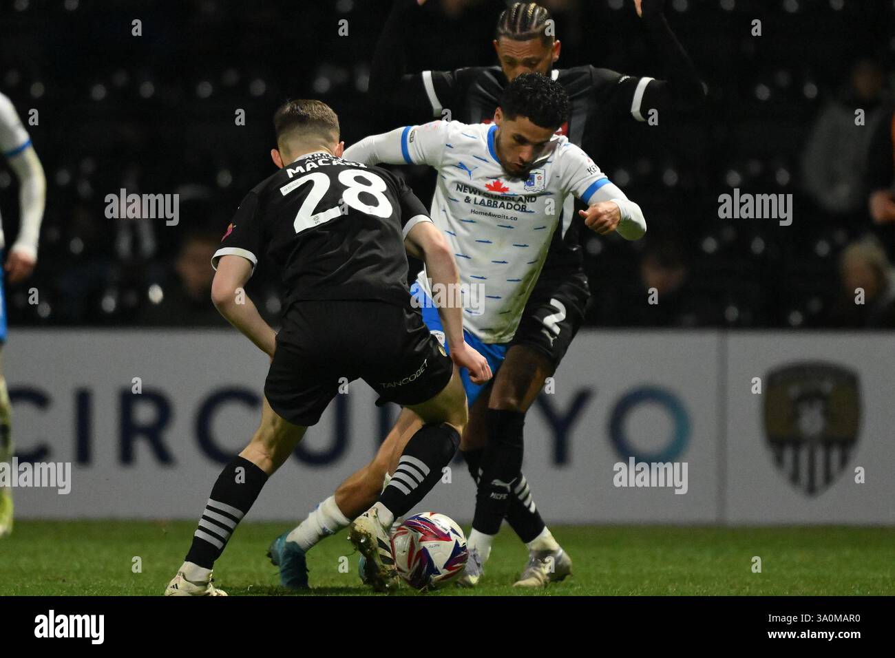 Tyler Smith of Barrow under pressure from Lewis Macari of Notts County ...