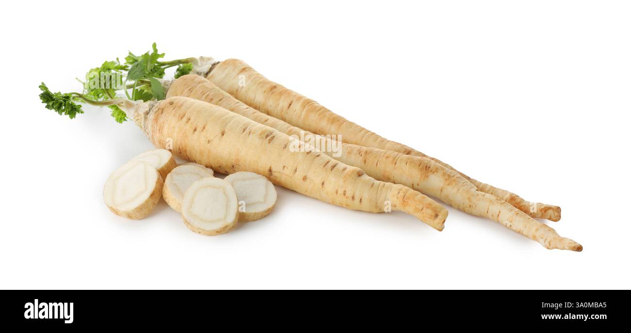 Whole and cut fresh parsley roots isolated on white Stock Photo - Alamy