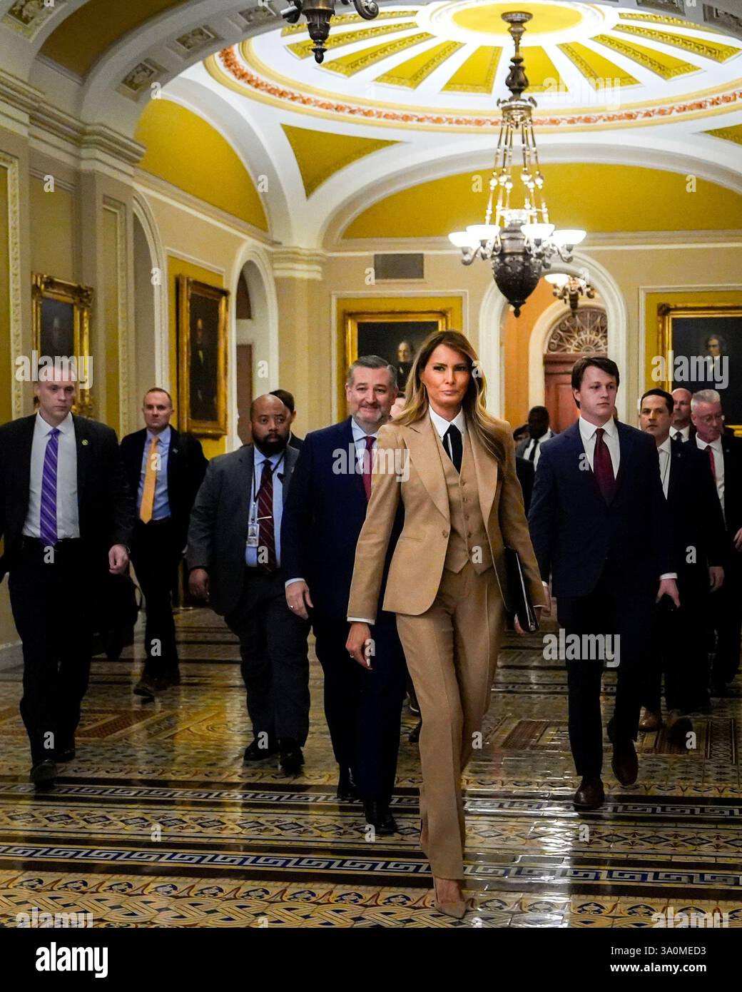 First lady Melania Trump walks through the Capitol, Monday, March 3 ...