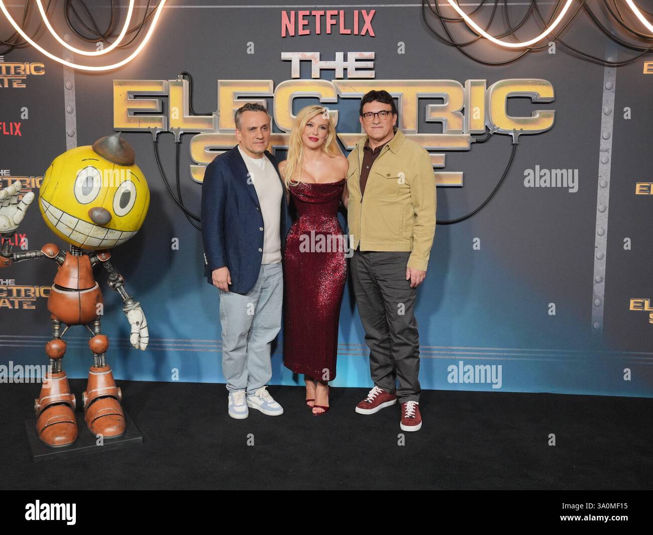 (left to right) Joe Russo, Millie Bobby Brown, and Anthony Russo arrive ...
