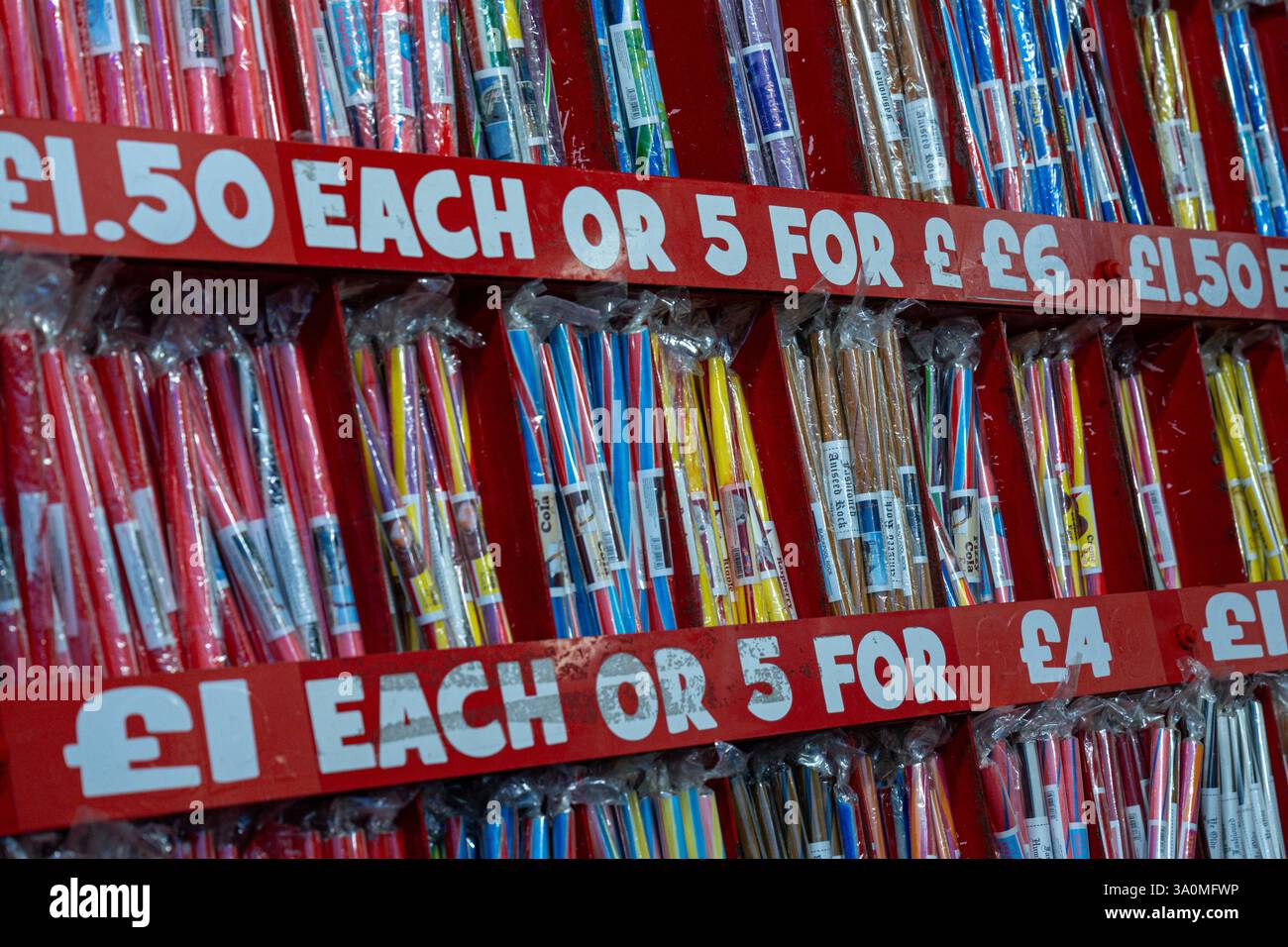 Colorful Candy Sticks Display at a Store Stock Photo - Alamy