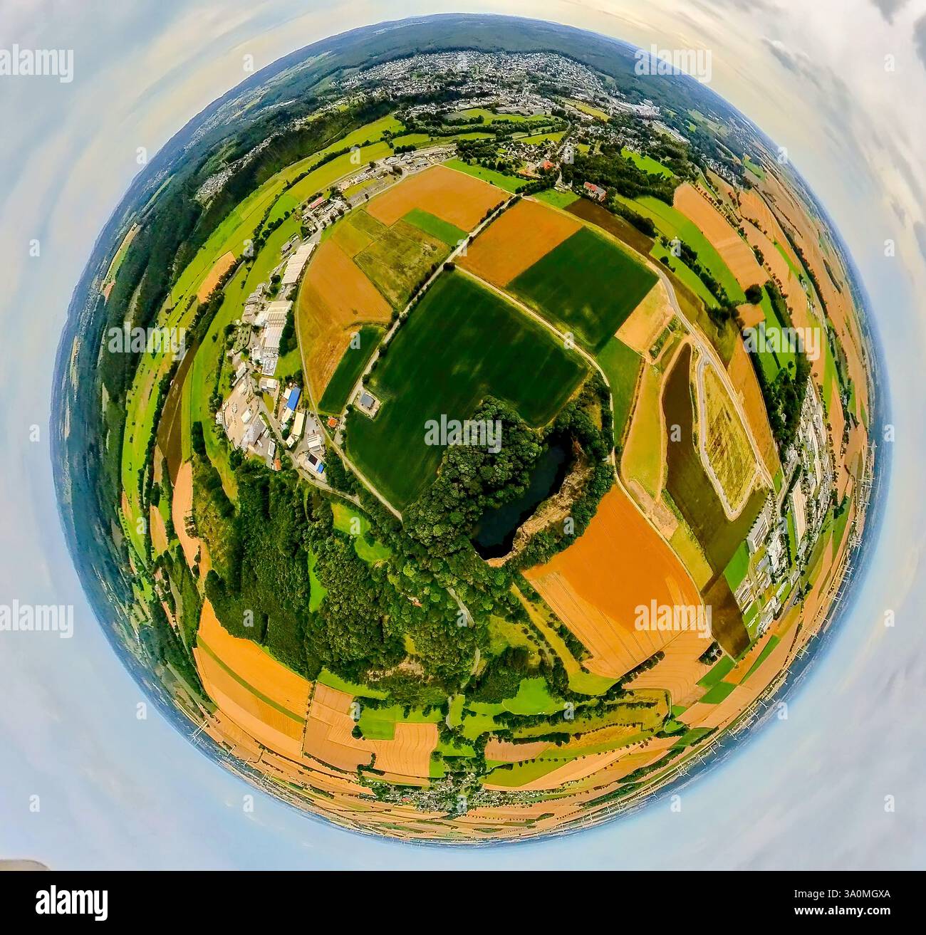 Aerial view, tiled structures, meadows and fields, industrial park ...