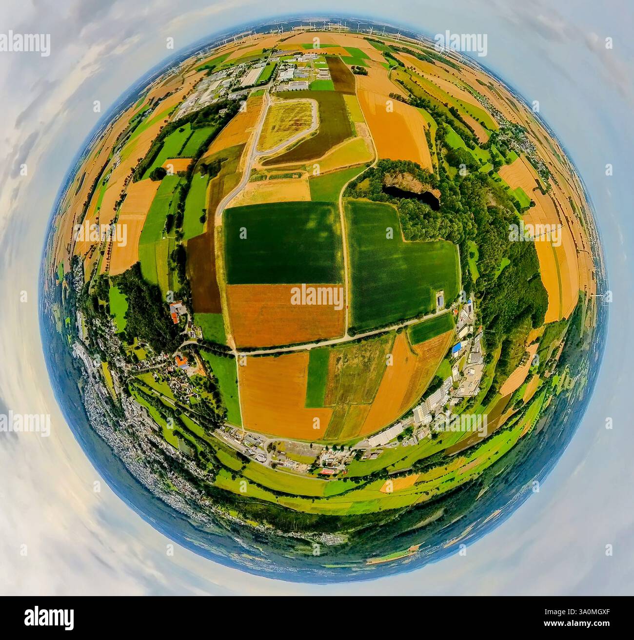 Aerial view, tiled structures, meadows and fields, industrial park ...