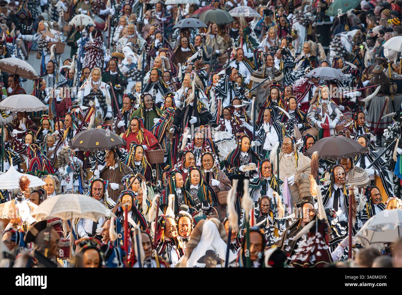04 March 2025, Baden-Württemberg, Rottweil: Numerous jesters walk ...