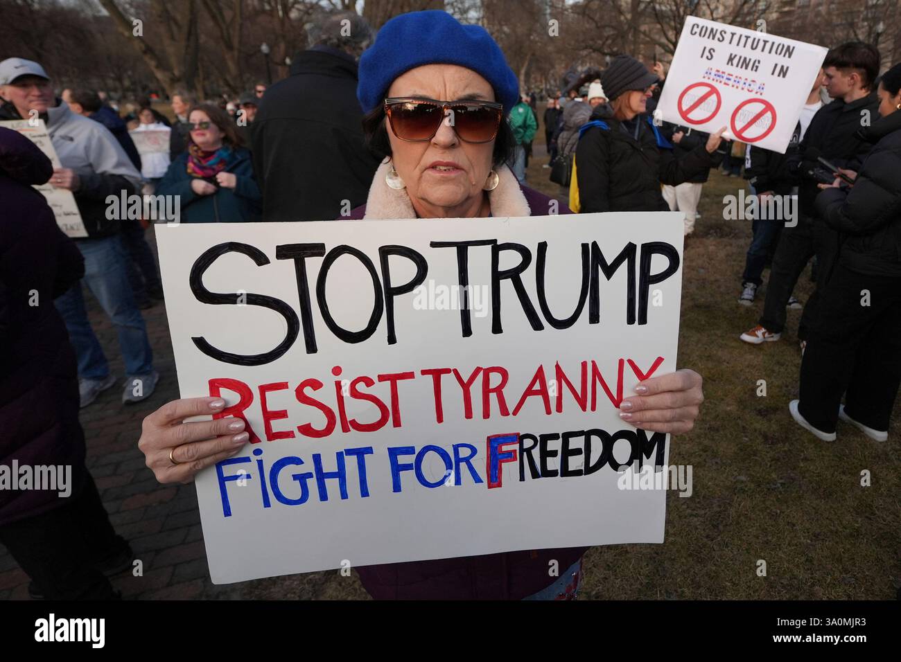 People protest on Boston Common, Tuesday, March 4, 2025, in Boston. (AP ...