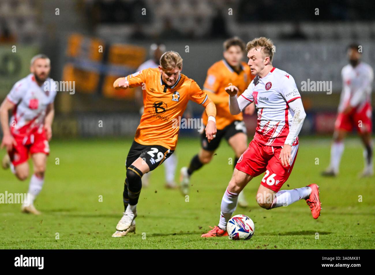 Eli King (26 Stevenage) challenged by Dom Ballard (29 Cambridge United) during the Sky Bet ...