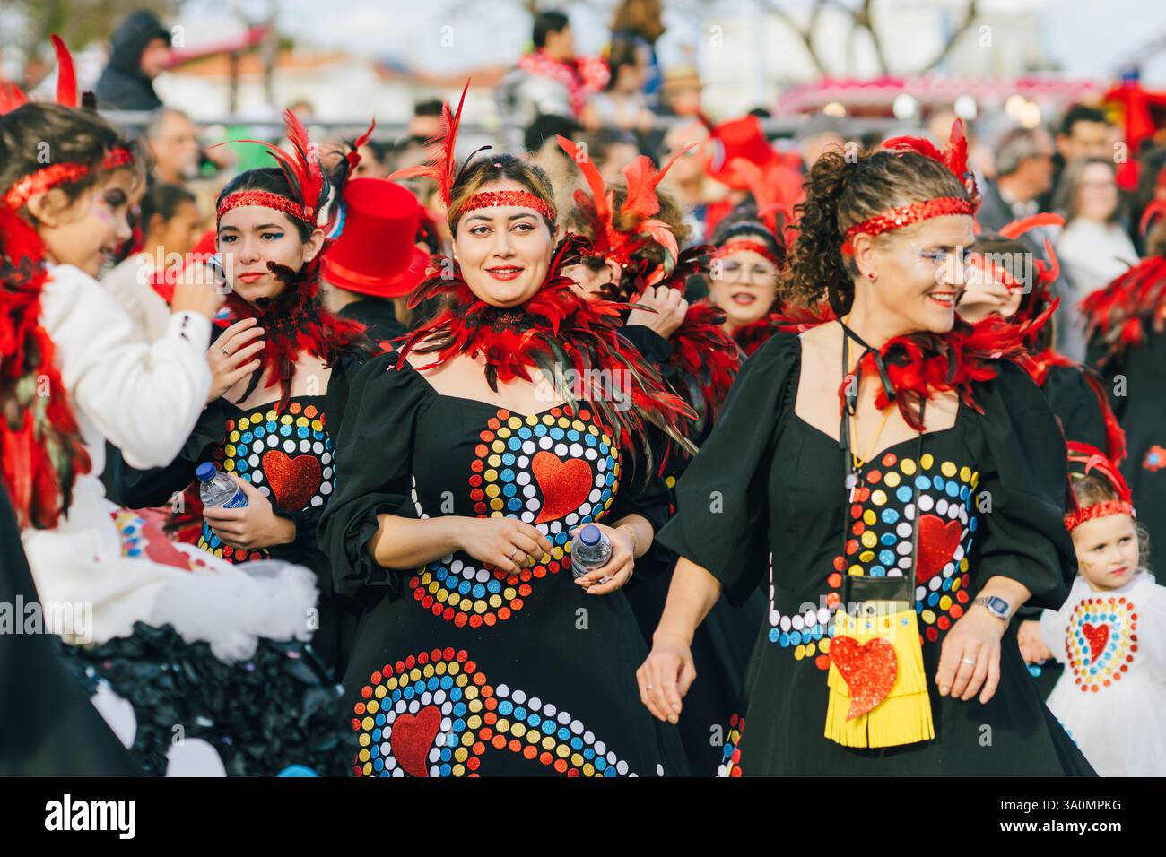 Altura, Portugal, March 2, 2025. Women dressed in black outfits with ...