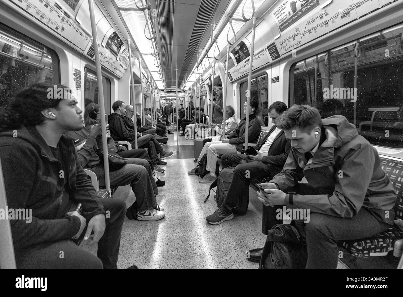 Passengers on the London Underground / London tube; Hammersmith and ...