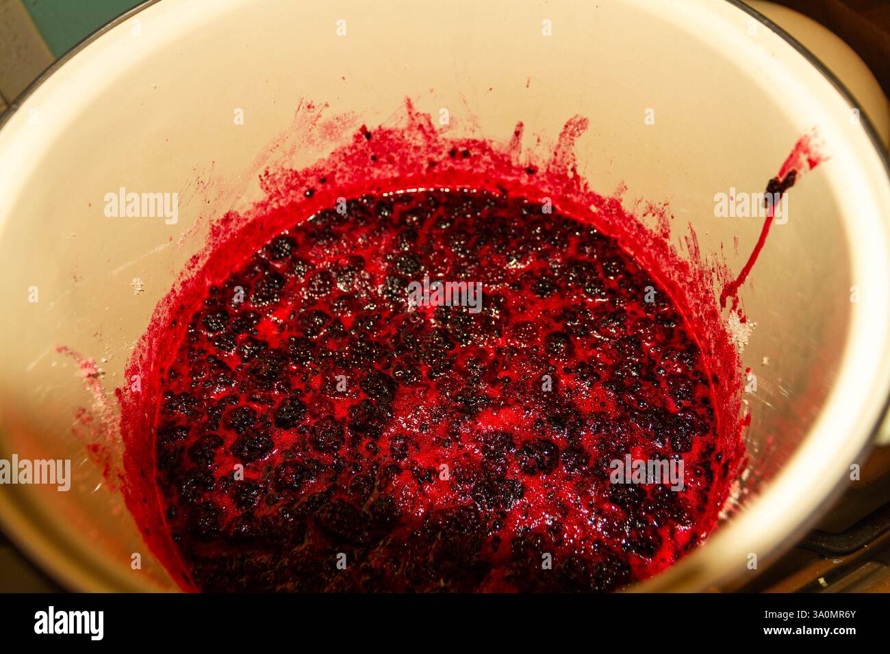 Blackberry or bramble jam being made, boiling in a stock pot Stock ...