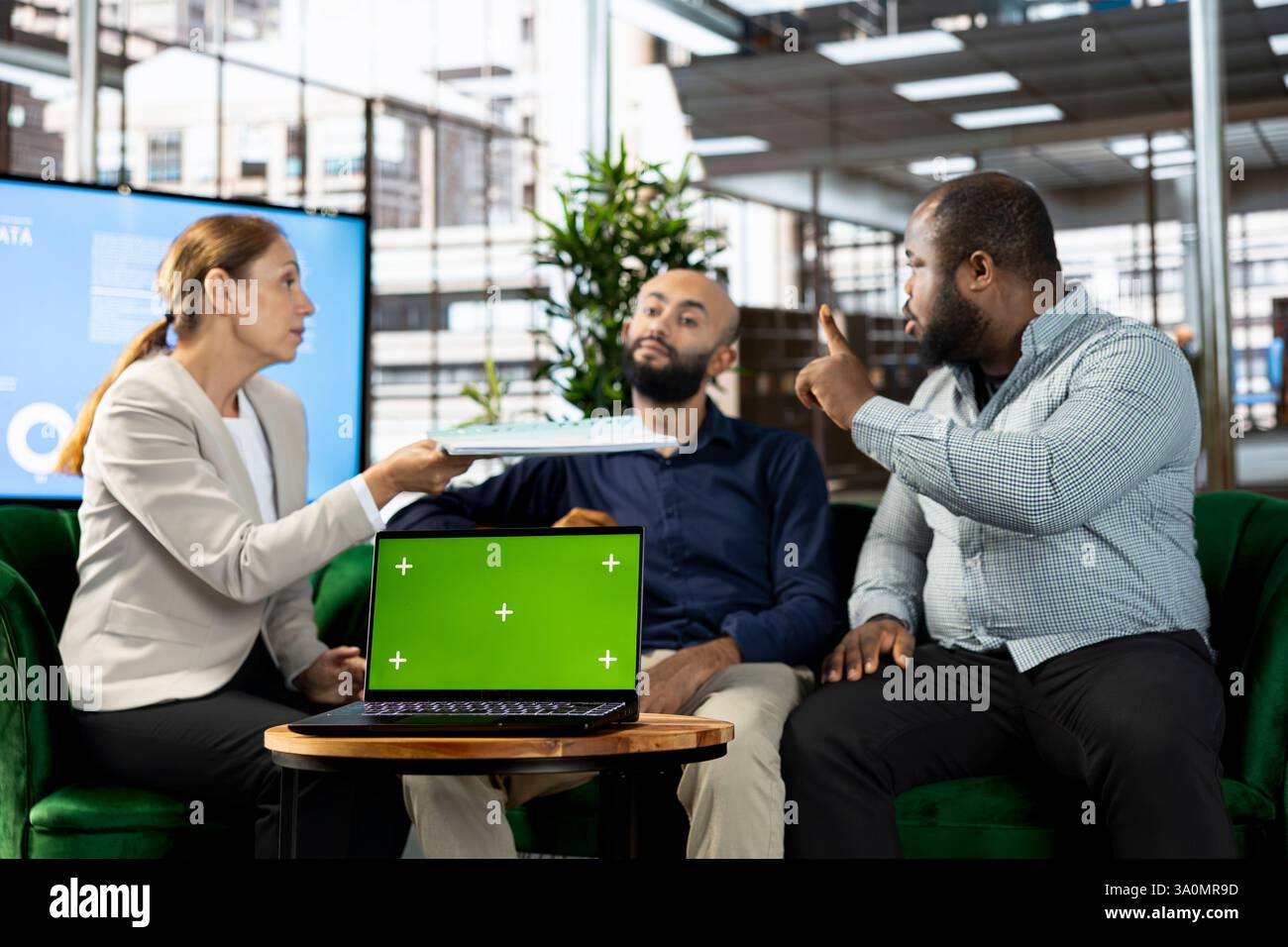 Multiethnic colleague using green screen laptop, doing briefing meeting ...
