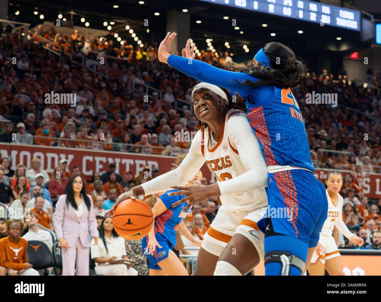 Texas forward Kyla Oldacre, left, looks to shoot against Florida ...