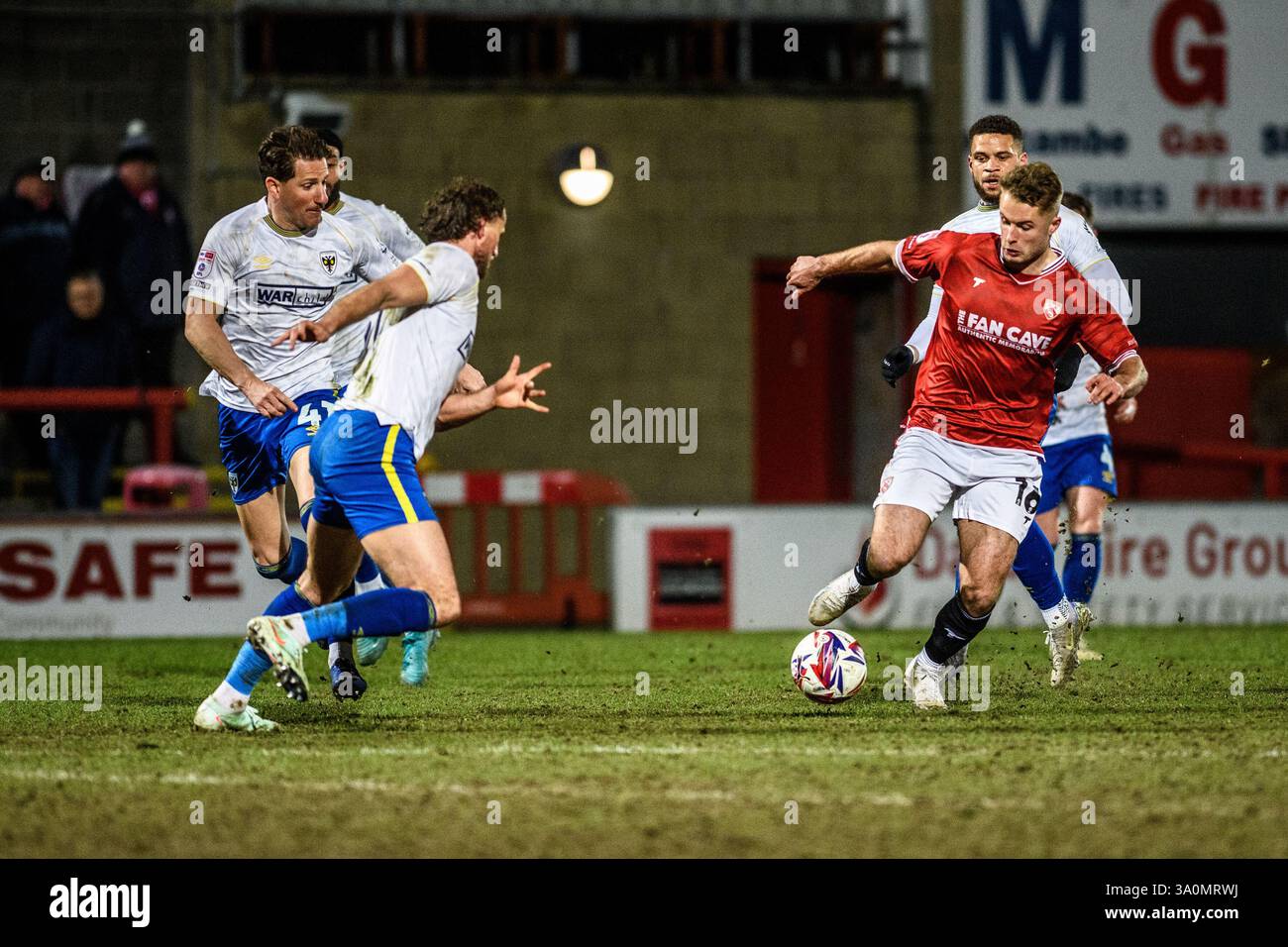 Morecambe FC's Andrew Dallas runs with the ball during the Sky Bet ...