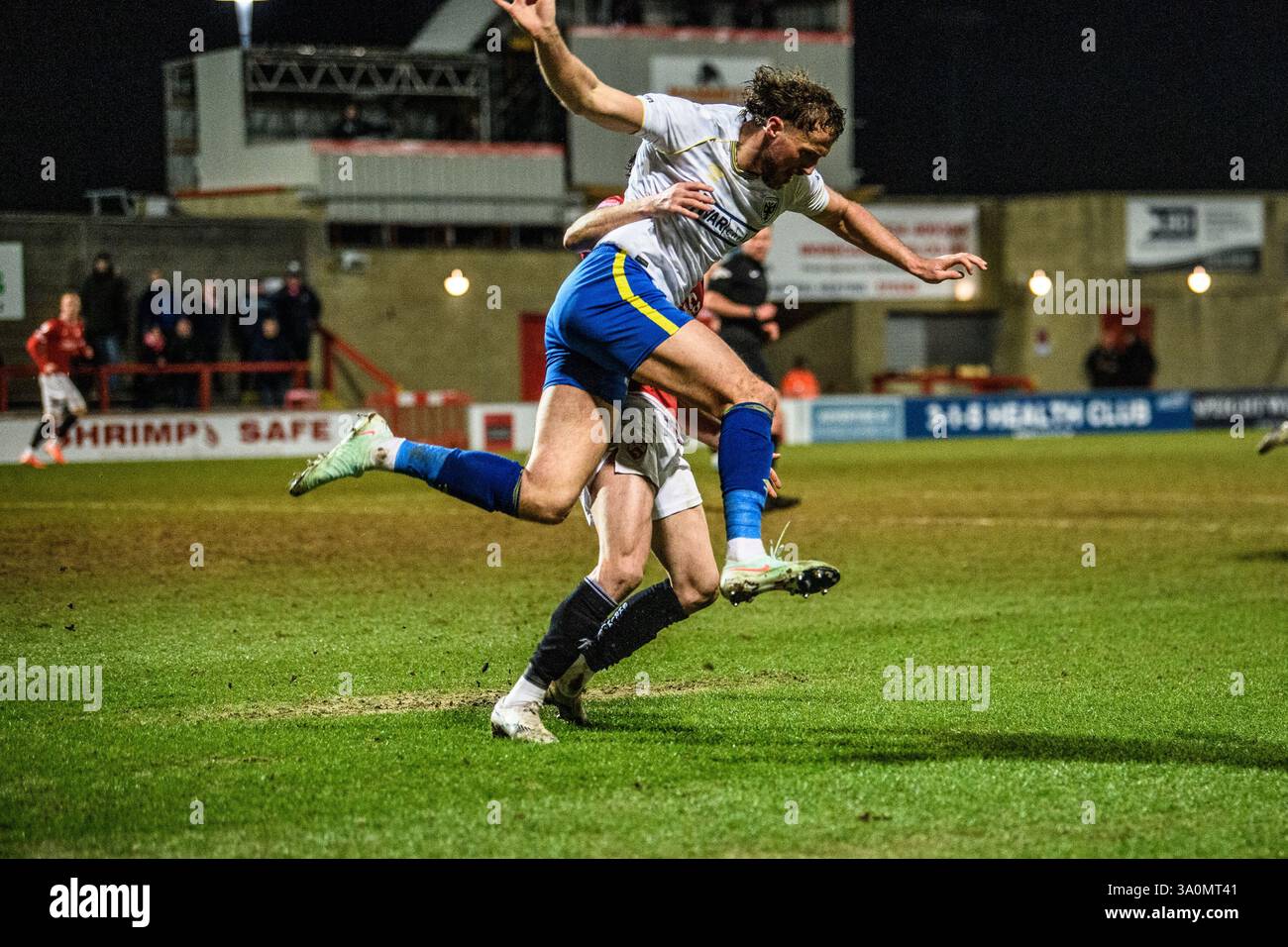 Morecambe FC's Gwion Edwards tackles Joe Lewis of AFC Wimbledon during ...