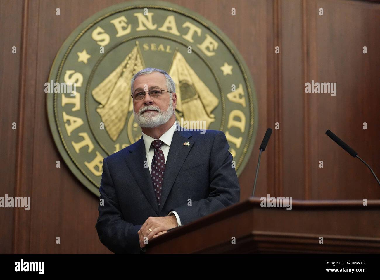 Florida Senate President Ben Albritton stands on the dais as he ...