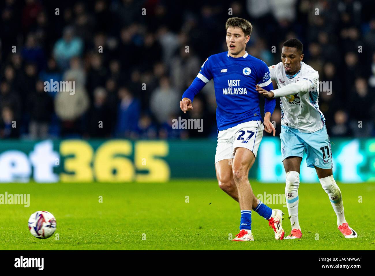 Rubin Colwill of Cardiff City (L) in action against Jaidon Anthony of ...