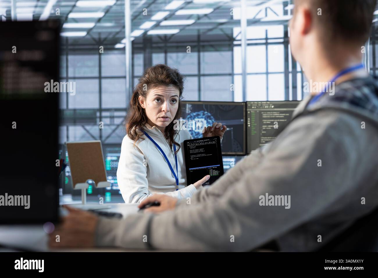 Programmers Using Tablet In Data Center Coordinating Deployment Of Server Architecture