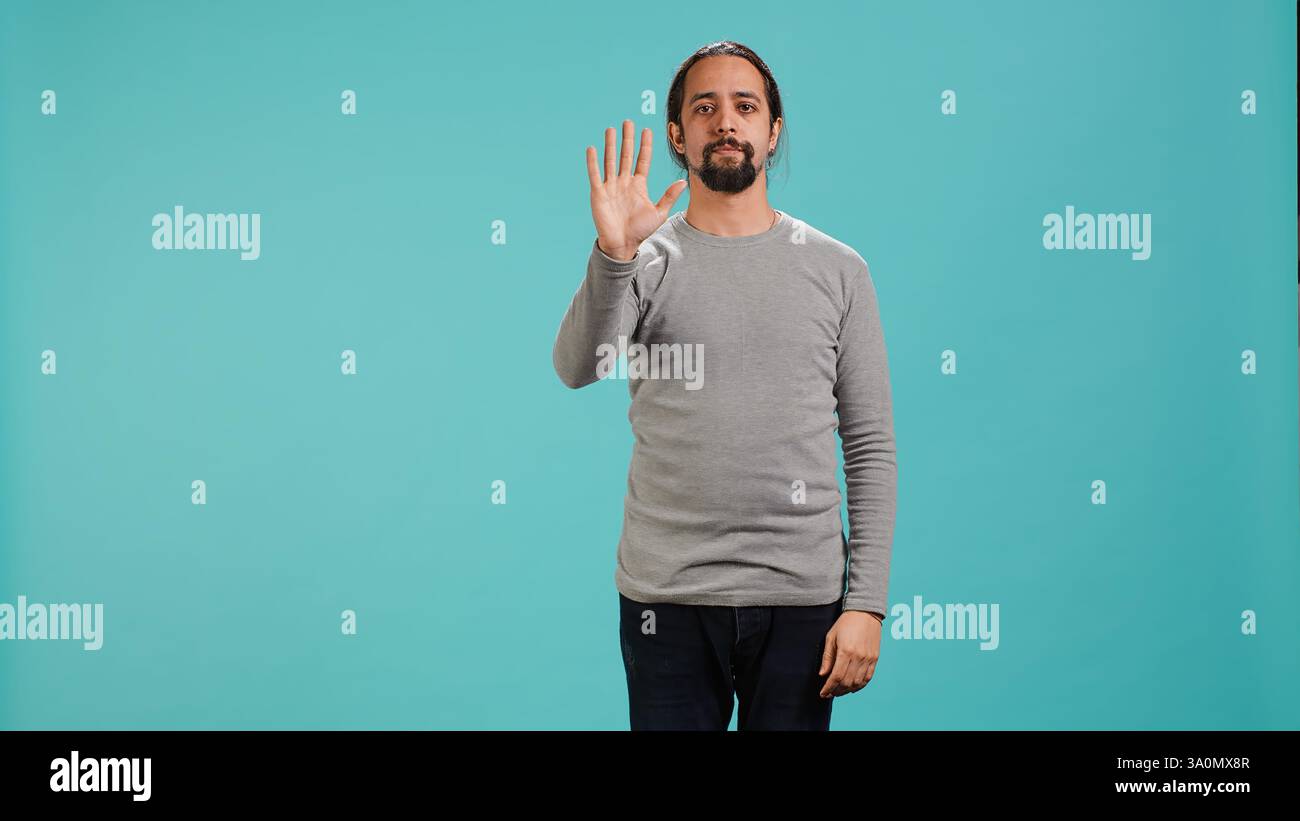 Man looking at AR hologram visualizations, doing swiping gestures ...