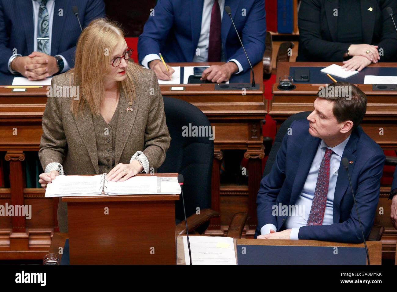 Victoria, Can. 04th Mar, 2025. Premier David Eby looks on as Minister ...