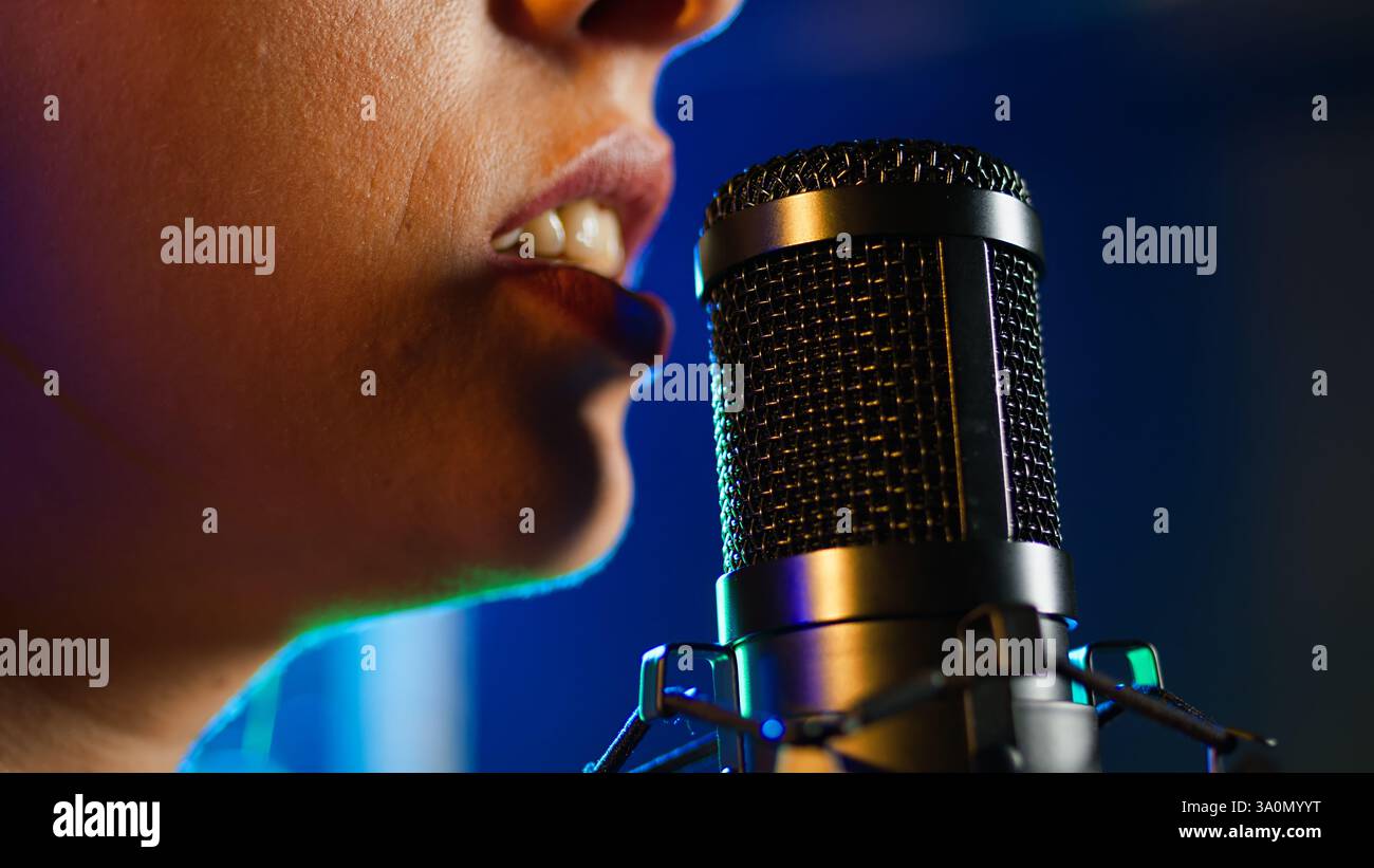 Punk rock artist singing a heavy metal alternative song on microphone ...