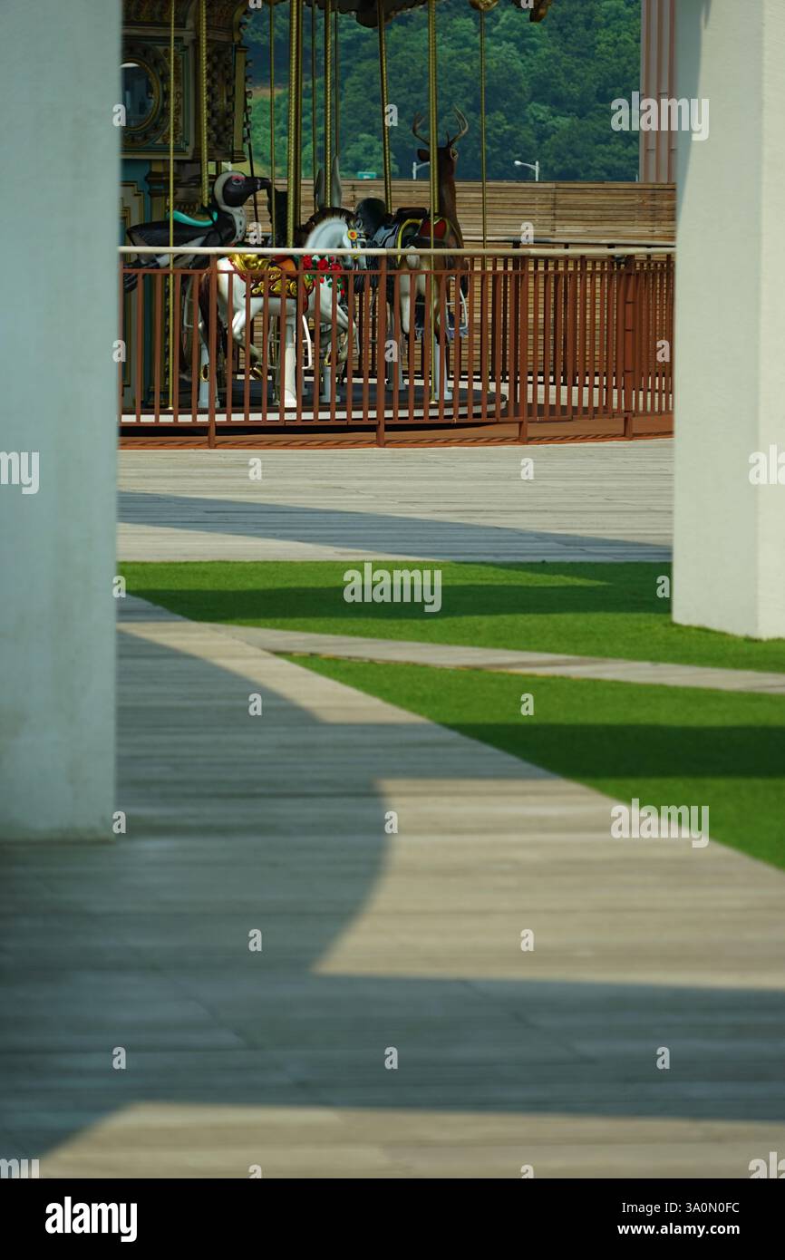 Wooden Deck to the Shadowy Carousel I Met at a Shopping Mall in Korea ...