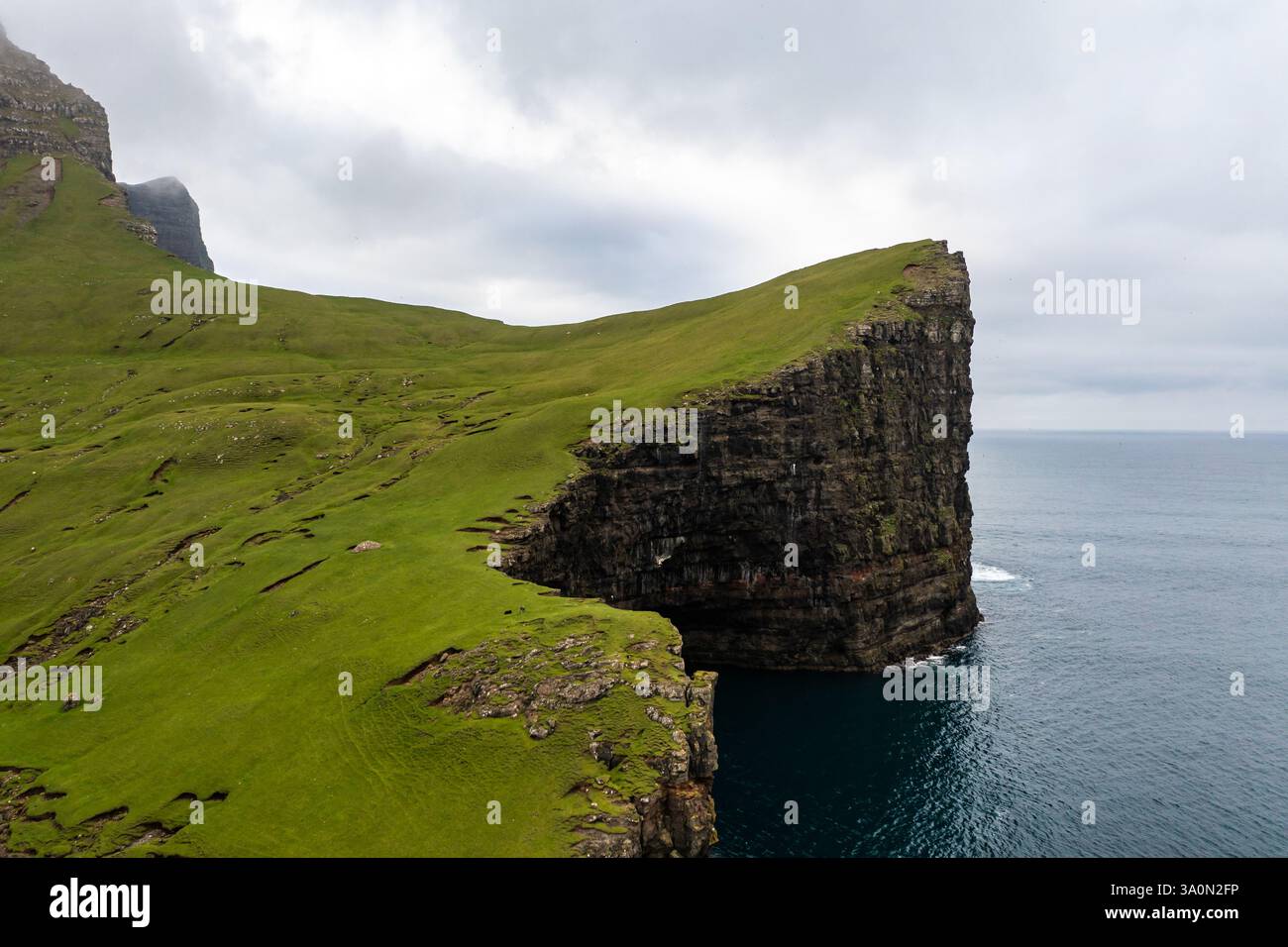 Explore breathtaking landscapes faroe hi-res stock photography and ...