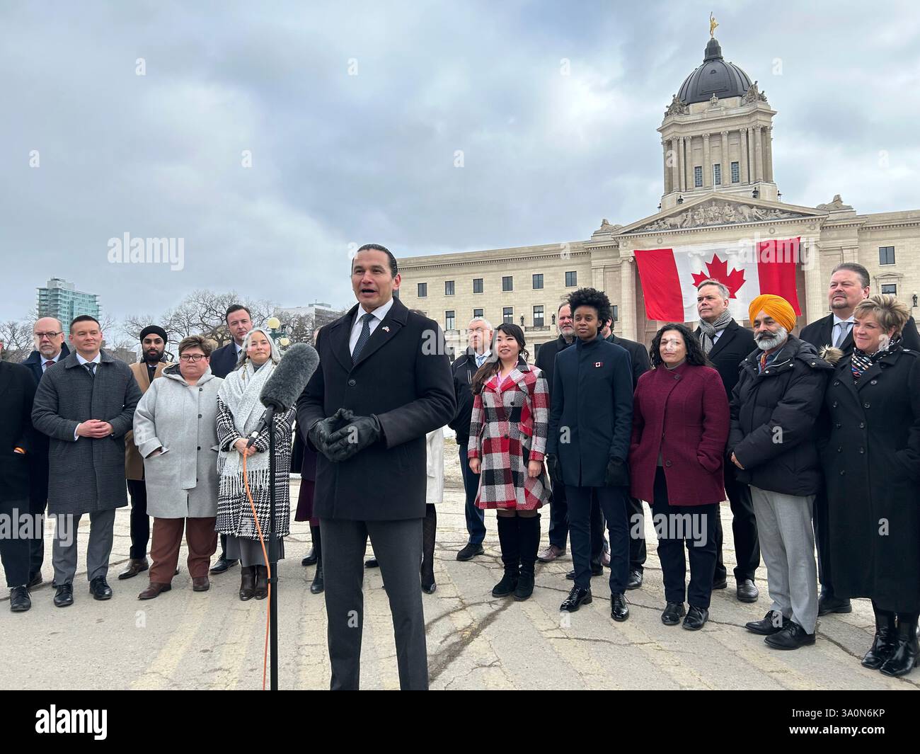 Winnipeg, Canada. 04th Mar, 2025. Premier Wab Kinew and members of his ...