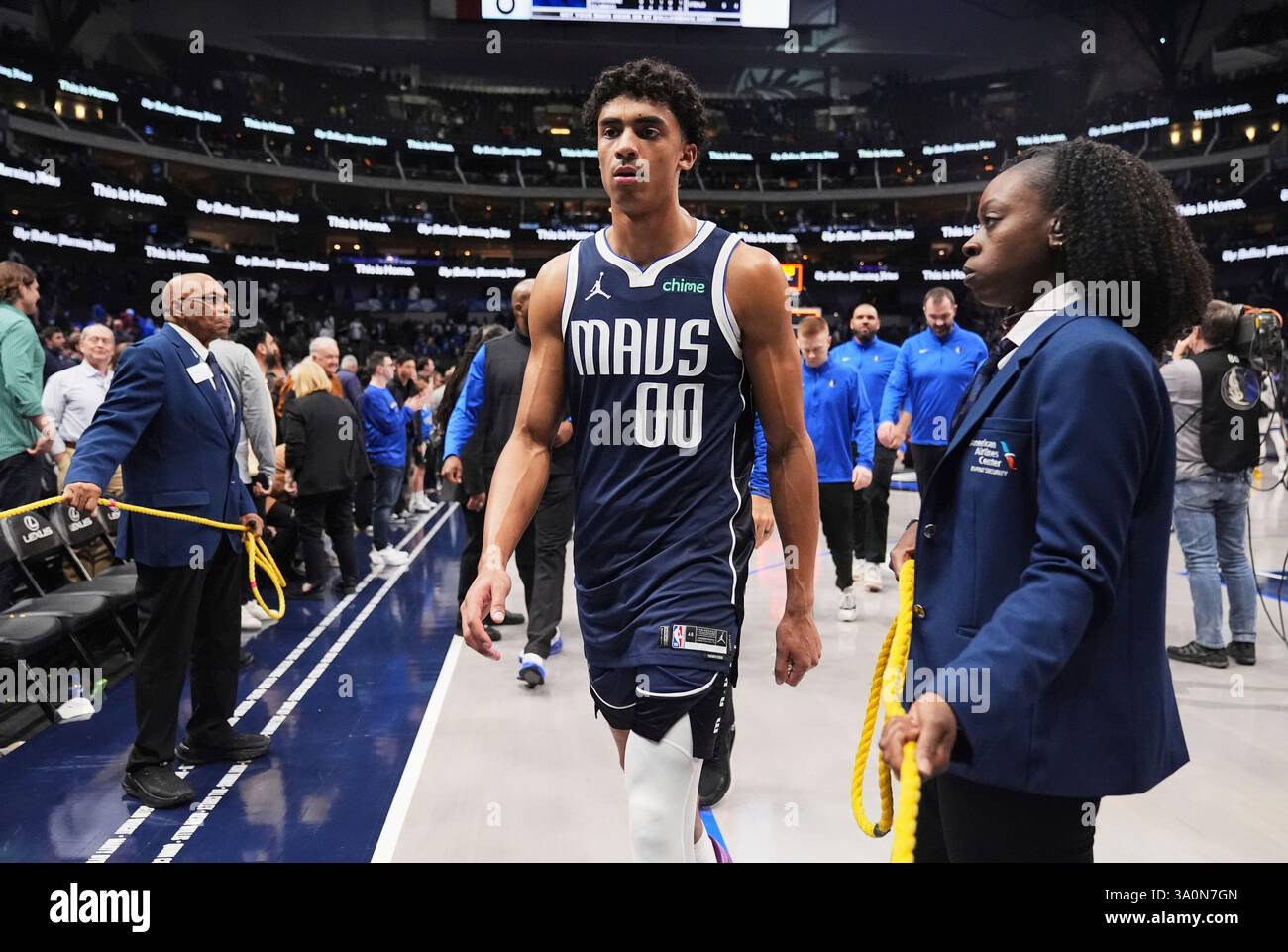 Dallas Mavericks guard Max Christie walks off the court after an NBA ...