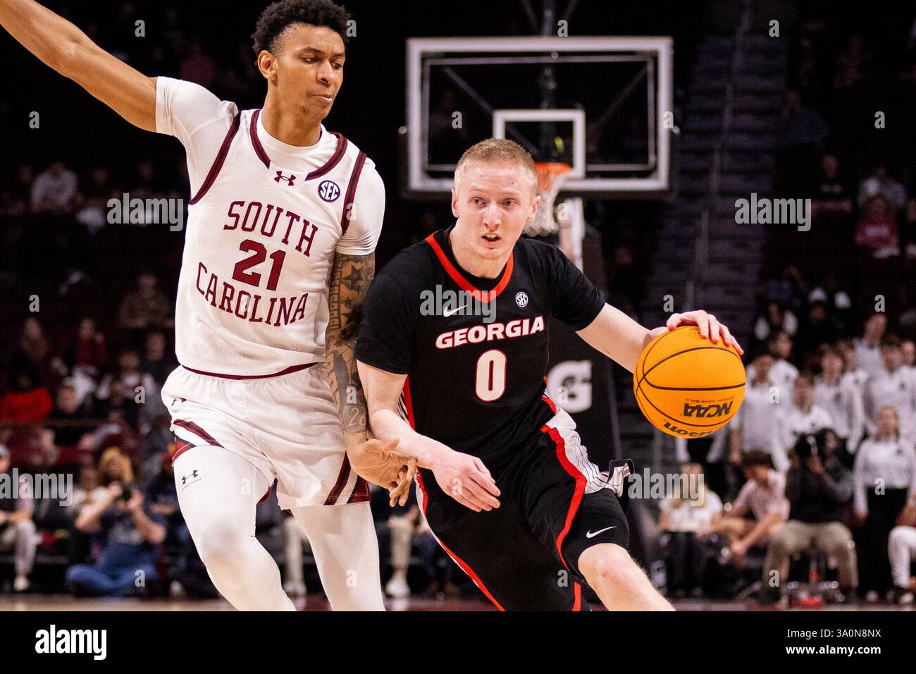 March 4, 2025: Georgia Bulldogs guard Blue Cain (0) drives past South ...