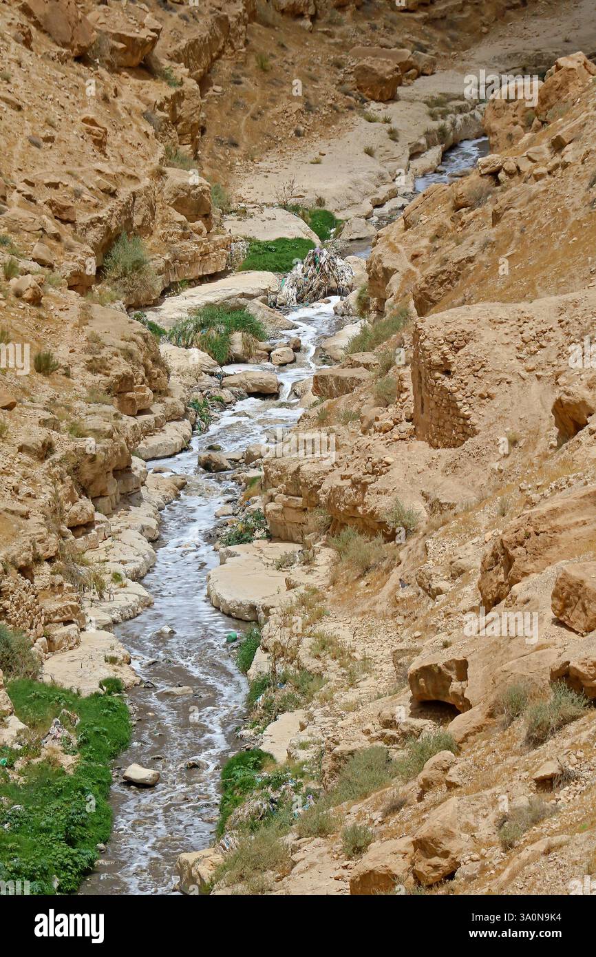 Water streaming down mountain cliff outside nature landscape Stock ...